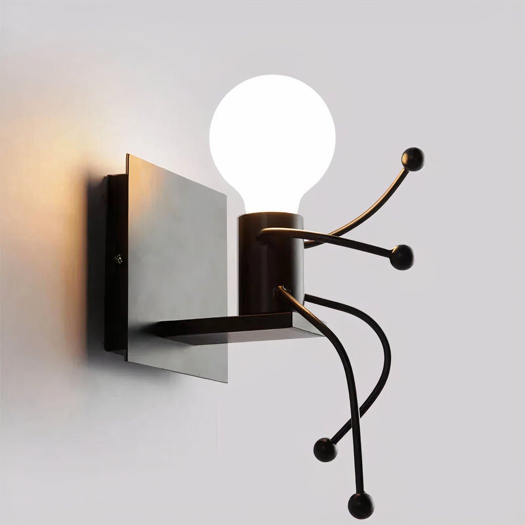 Lampada da parete minimalista e moderna con una figura seduta ...